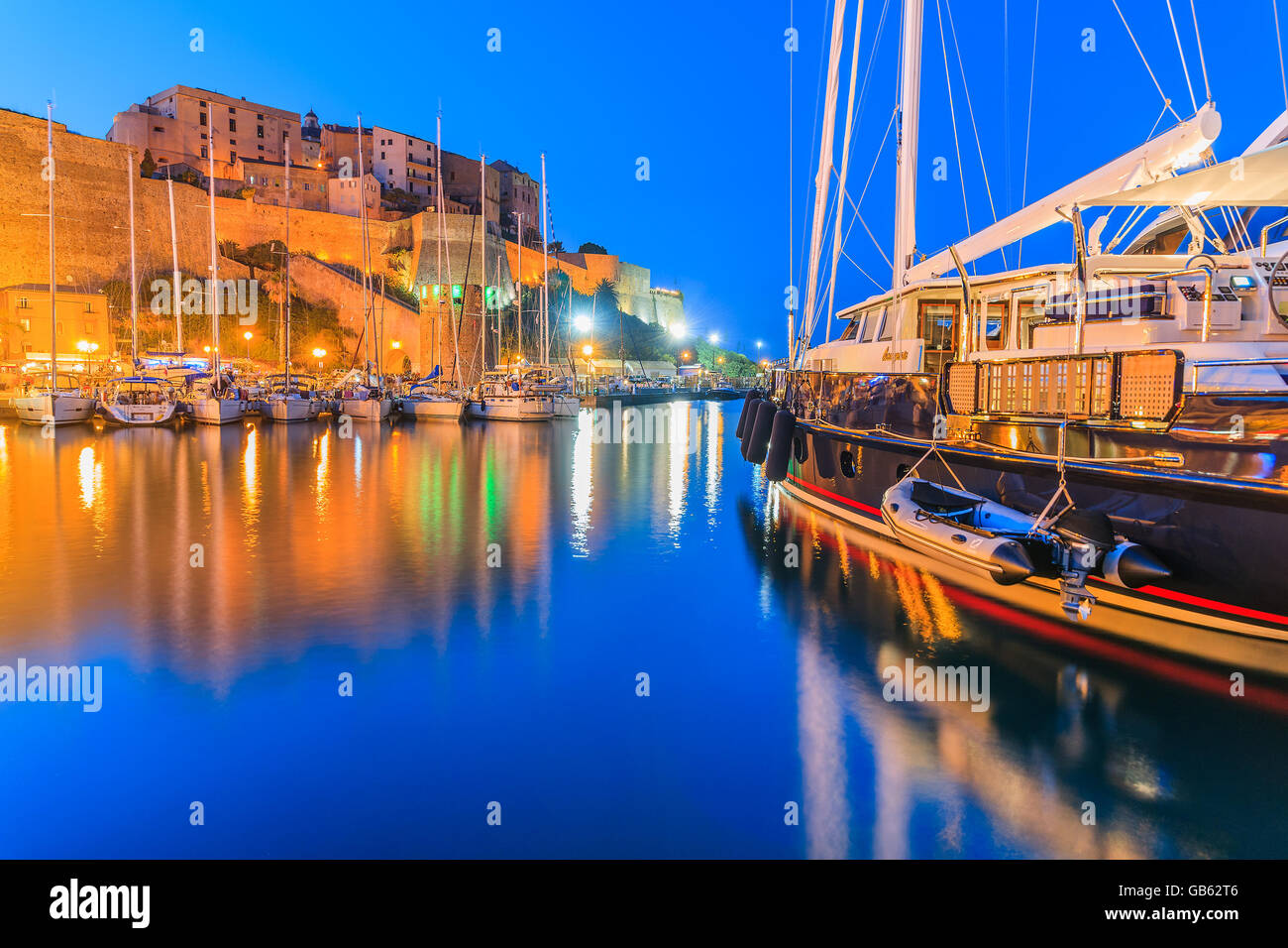 CALVI PORT, CORSICA ISLAND - JUN 30, 2015: historic buildings and yacht ...
