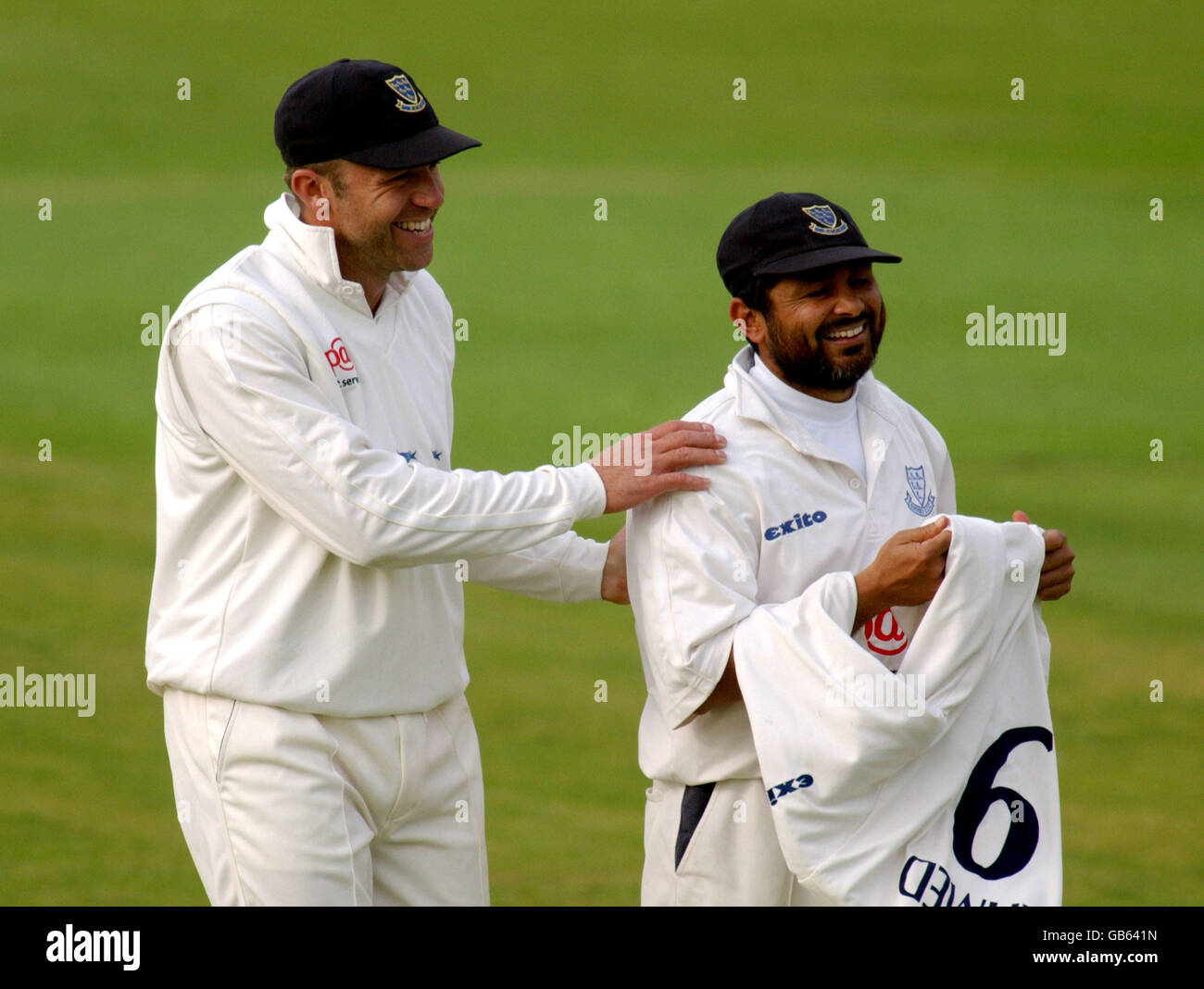 l-r; Sussex's Captain Chris Adams has a laugh with Mushtaq Ahmed ...
