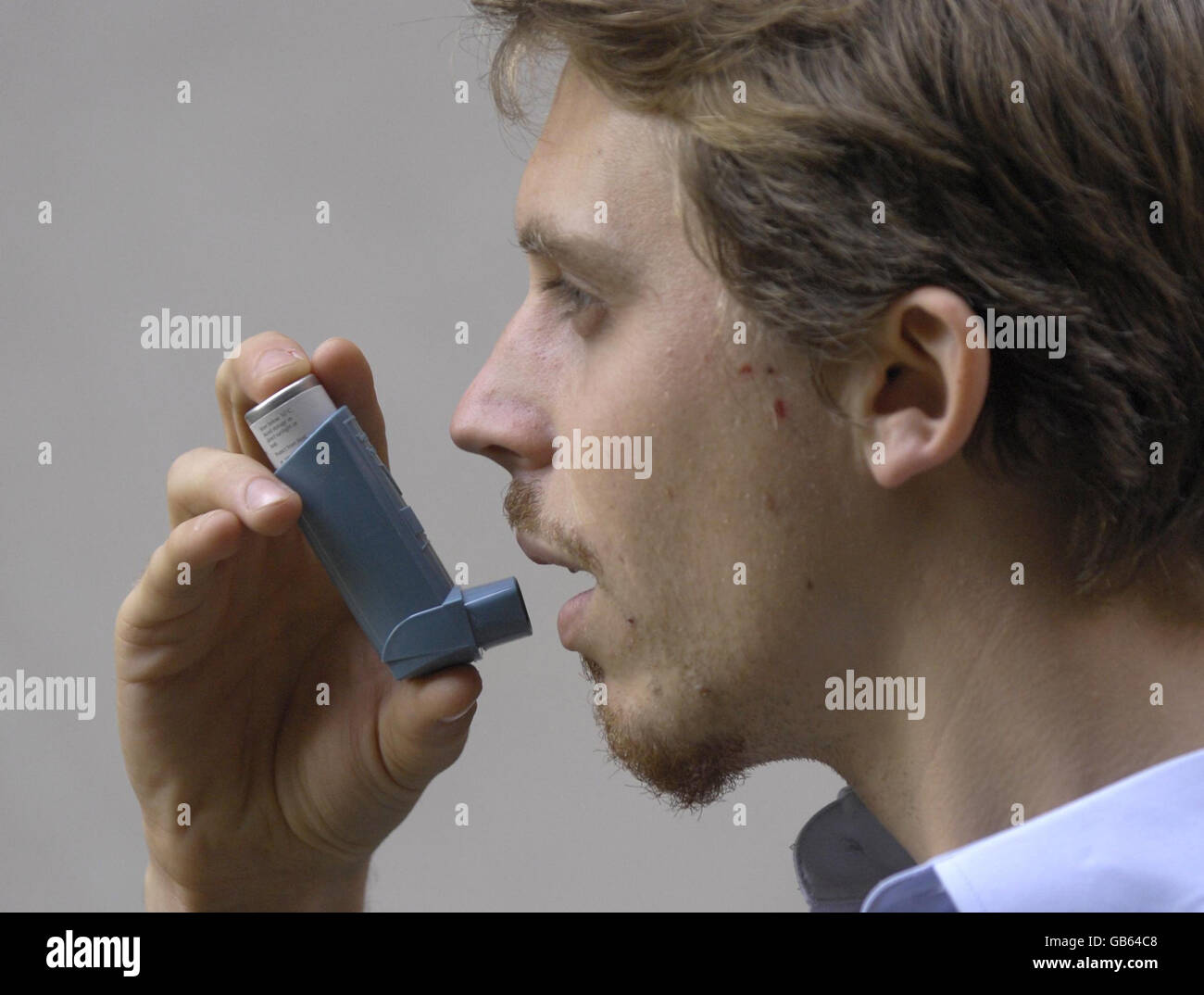 Stock picture male using inhaler hi-res stock photography and images ...