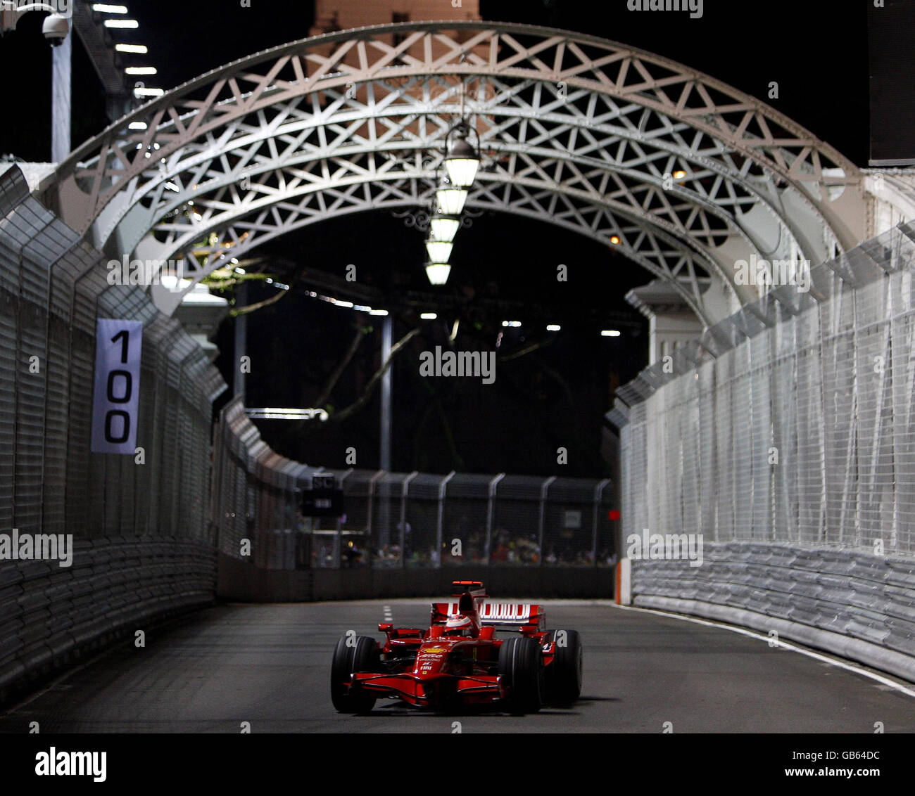Ferrari's Kimi Raikkonen drives over the Anderson Bridge during a ...