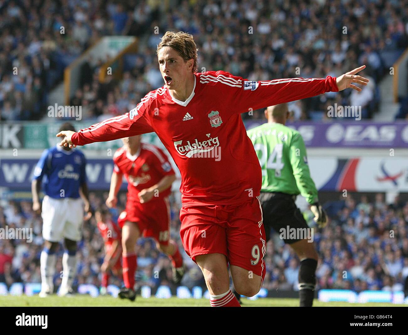 Liverpool's Fernando Torres celebrates after scoring the opening goal ...