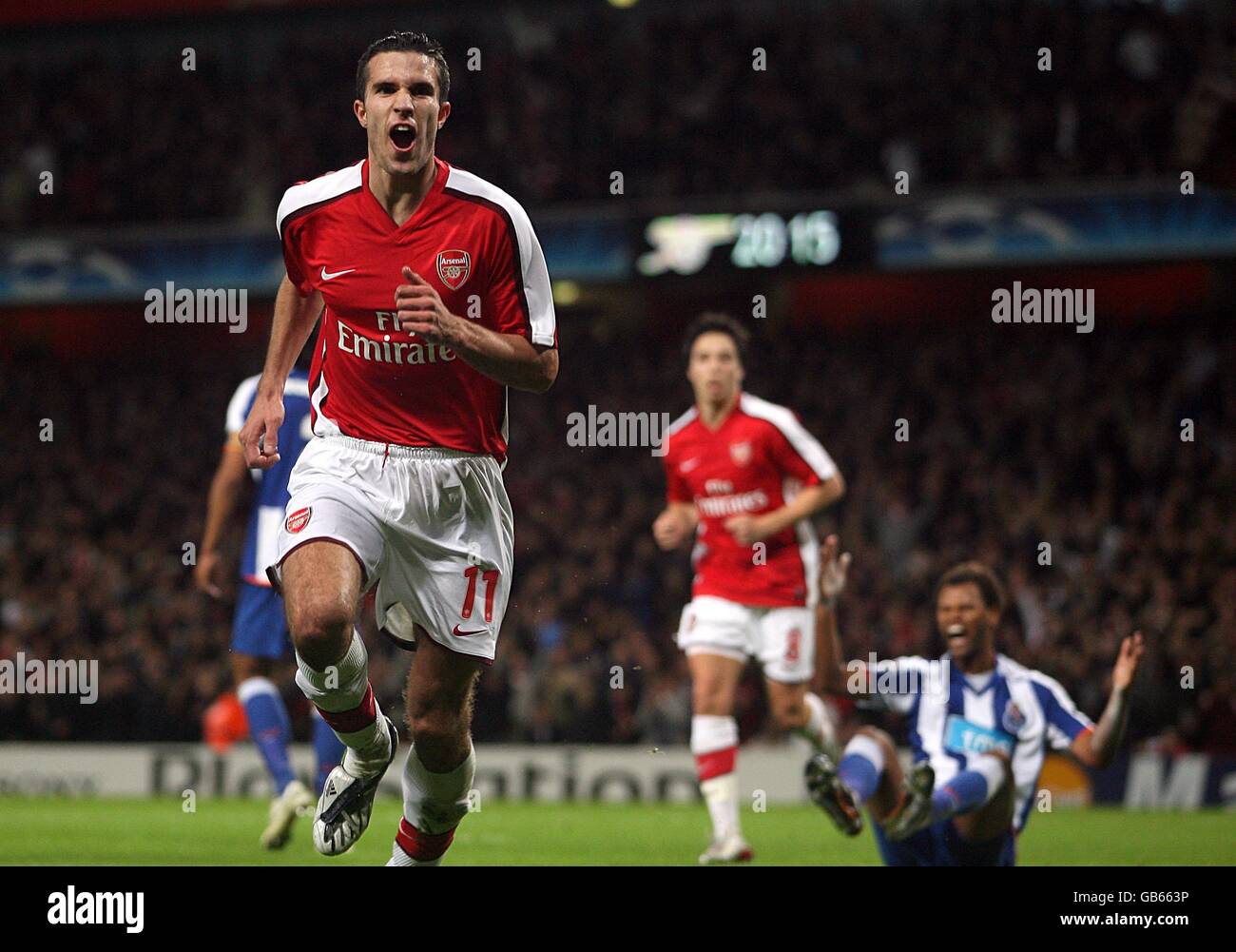 Arsenal's Robin Van Persie celebrates after scoring the first goal of ...