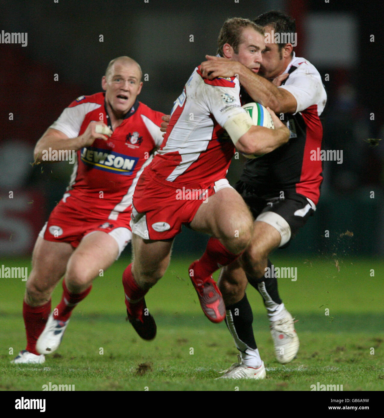 Gloucester Rugby's James Simpson-Daniel is tackled by Biarritz ...