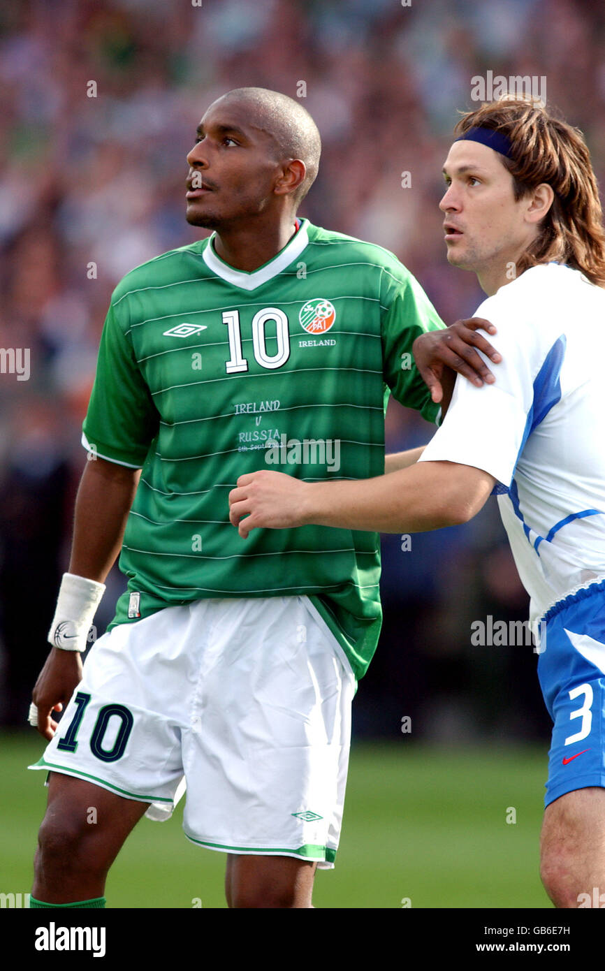 (L-R) Ireland's Clinton Morrison and Russia's Vadim Eseev both keep ...
