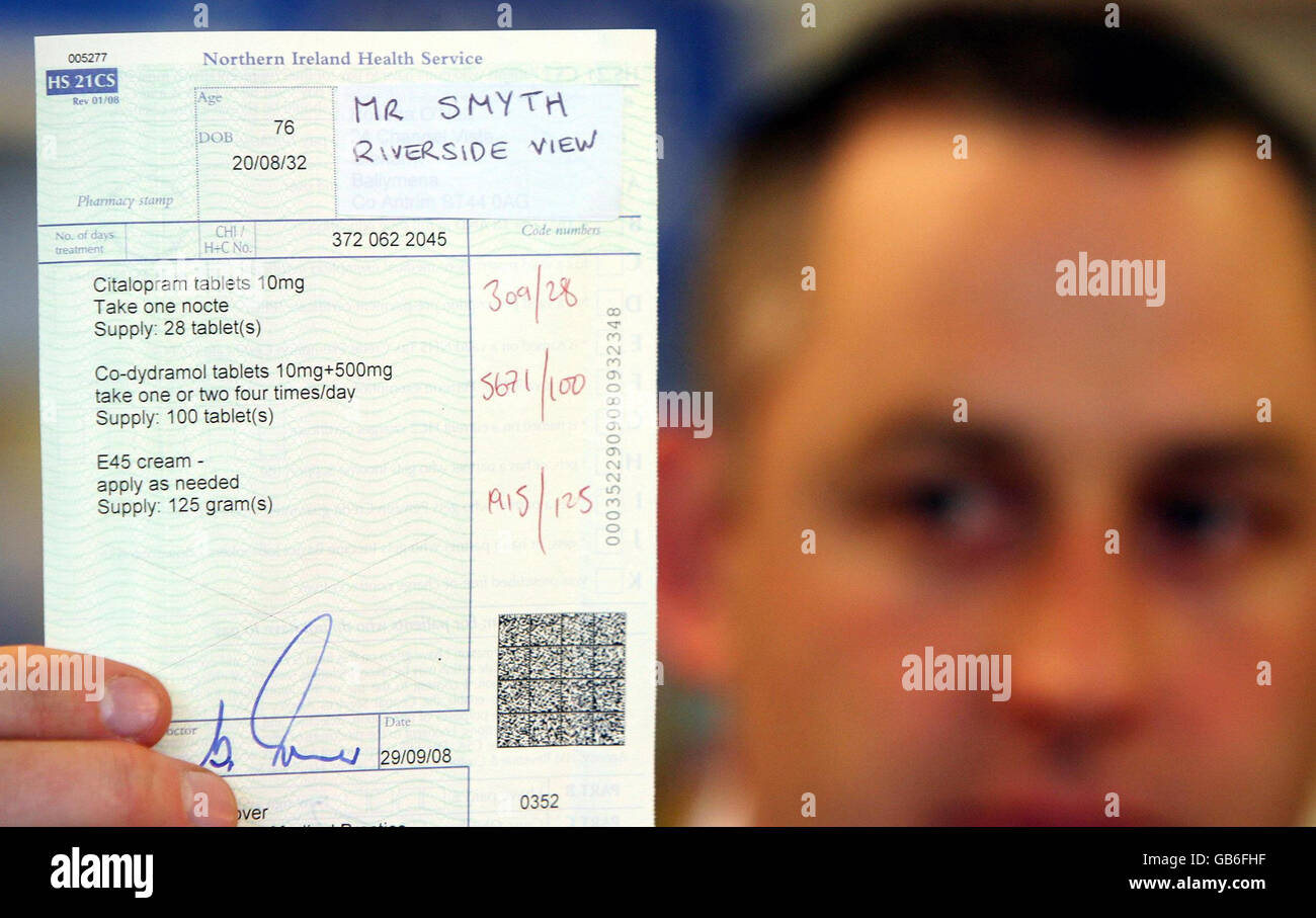 Carnlough pharmacist Gerard Turner holds up a prescription today after ...