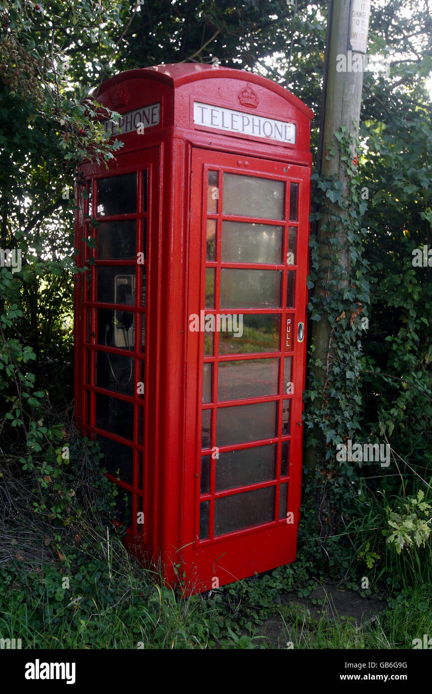 General view of a red telephone box Stock Photo - Alamy