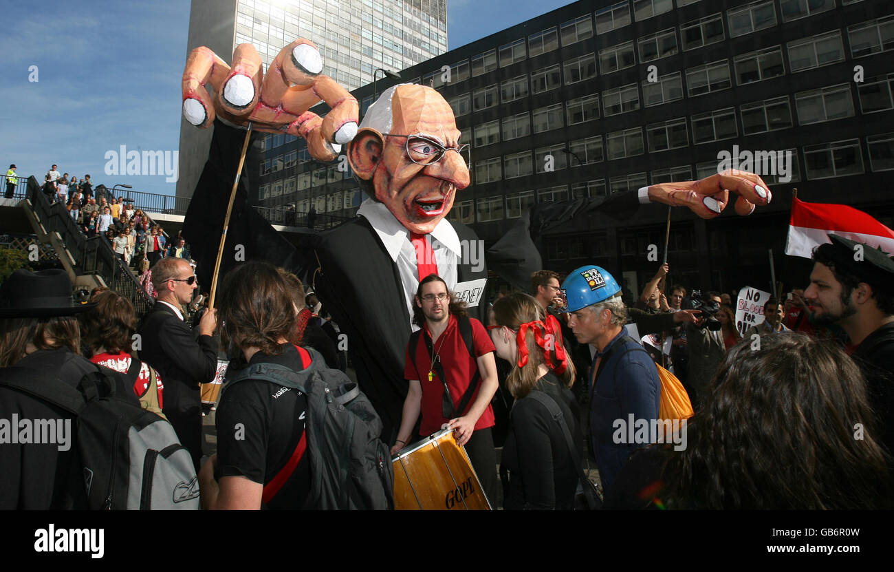 Protesters carrying a 12-foot high puppet of American vice president ...