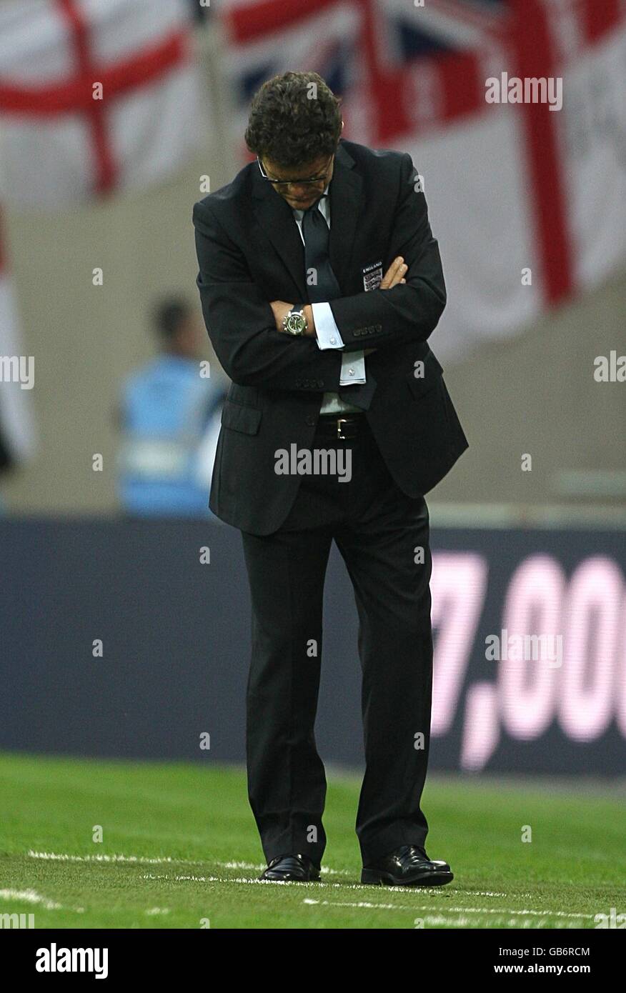 England manager fabio capello looks on hi-res stock photography and ...