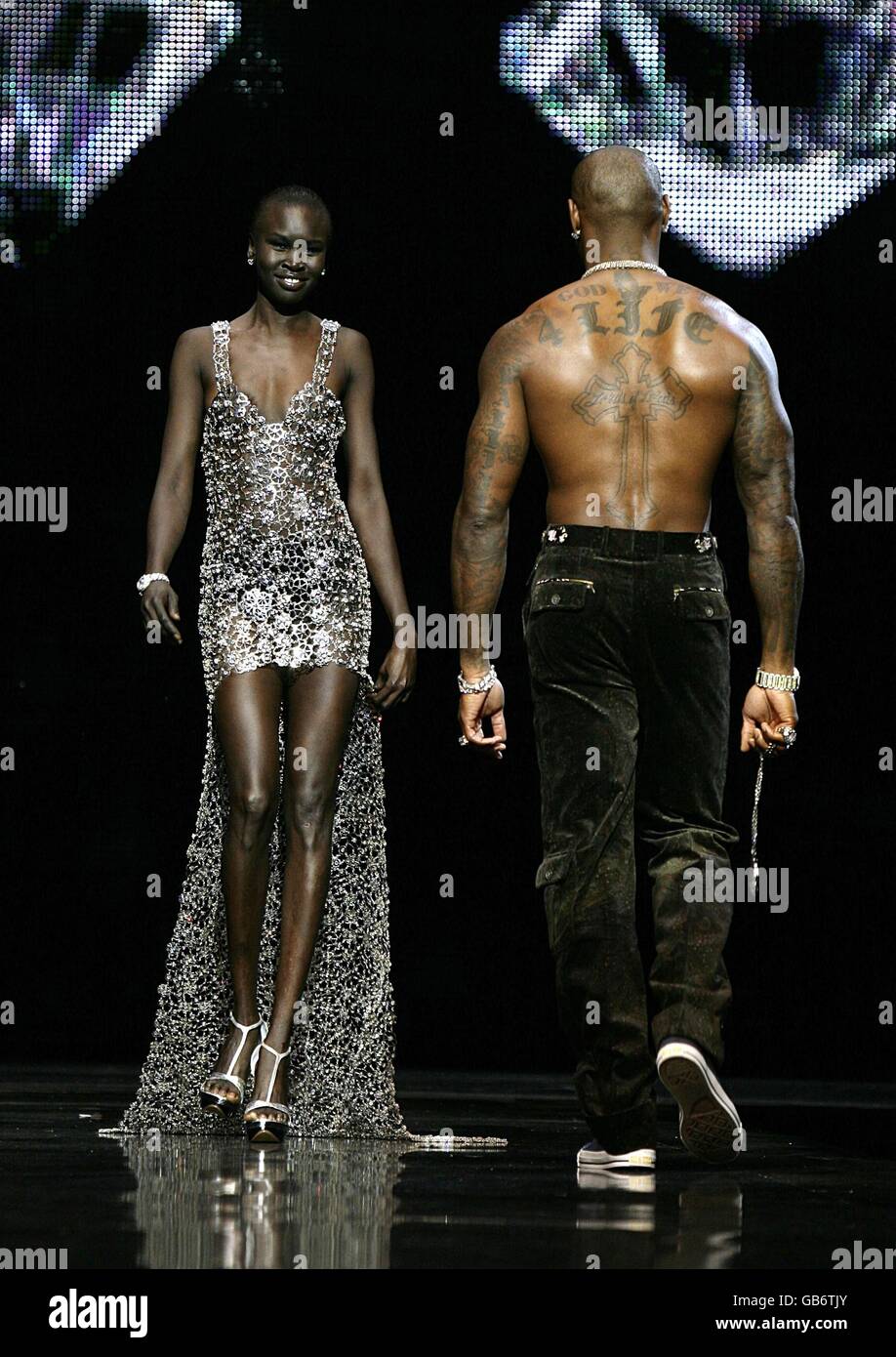 Models Alex Wek (left) and Tyson Beckford on stage at the Africa Rising ...