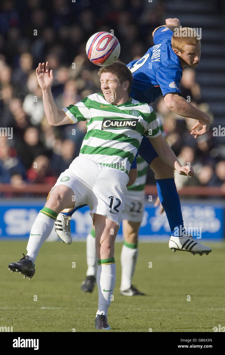 Celtic's Mark Wilson (left) battles with Inverness' Adam Rooney during ...