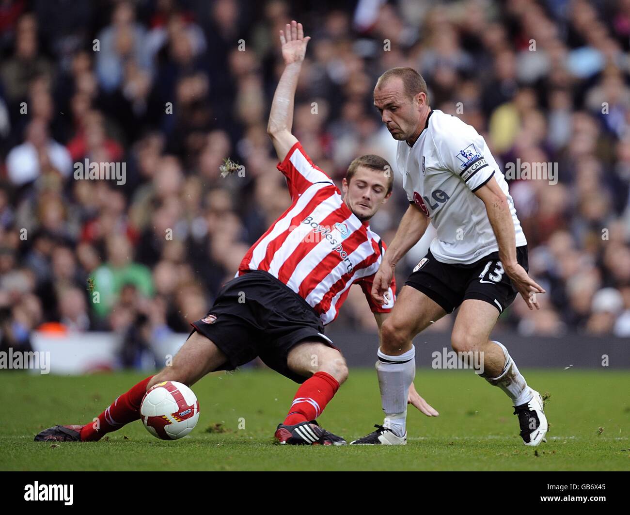 Fulham's Danny Murphy (right) and Sunderland's George McCartney battle ...