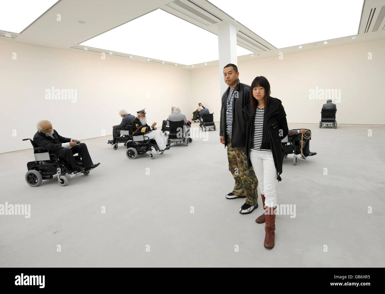 Artists Sun Yuan and Peng Yu pose in front of their piece 'Old Persons ...