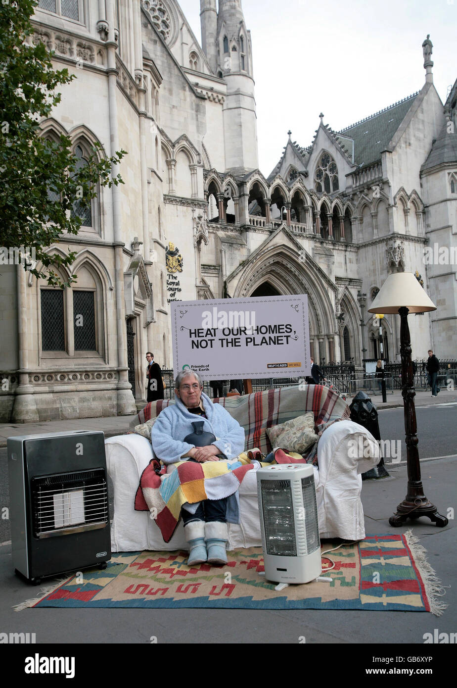 Mary Phillips, 72, sits in an outdoor living room with heaters outside ...