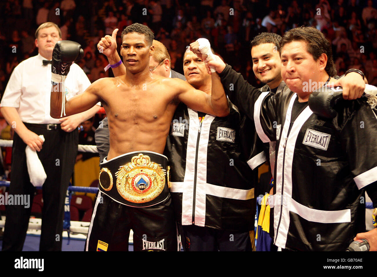 Breidis Prescott celebrates his victory over Amir Khan during their ...