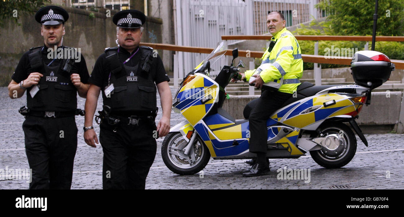 Police force reveal new eco friendly scooter hi-res stock photography ...