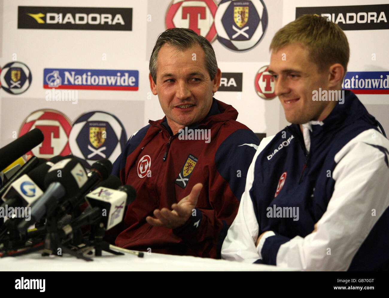 Scotland manager George Burley (left) and captain Darren Fletcher ...