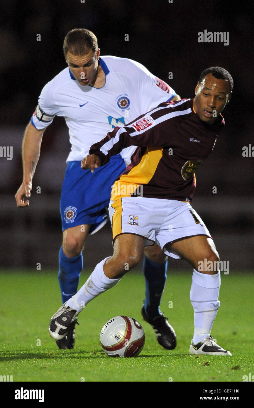 Hartlepool United's Sam Collins and Northampton Town's Karl Hawley in ...