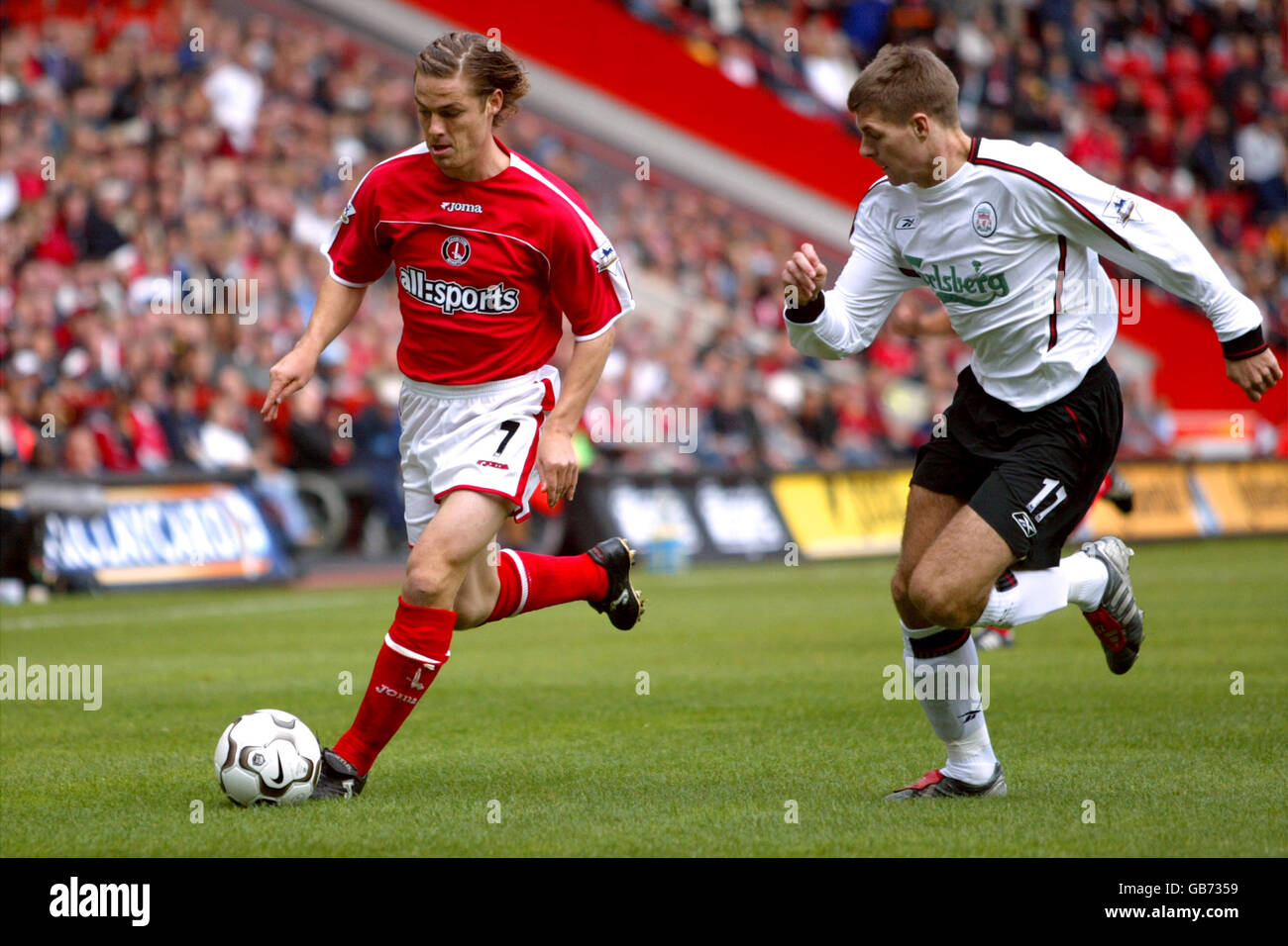 Charlton Athletic's Scott Parker takes the ball past Liverpool's Steven ...