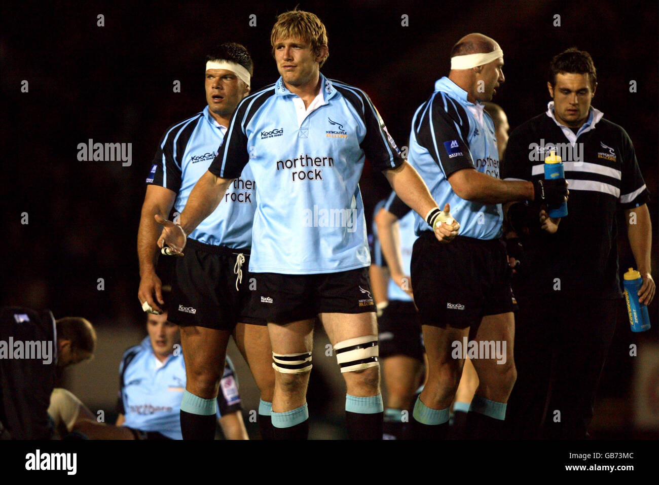 Newcastle Falcons' Marius Hurter (l) looks on as teammate Garath Archer ...