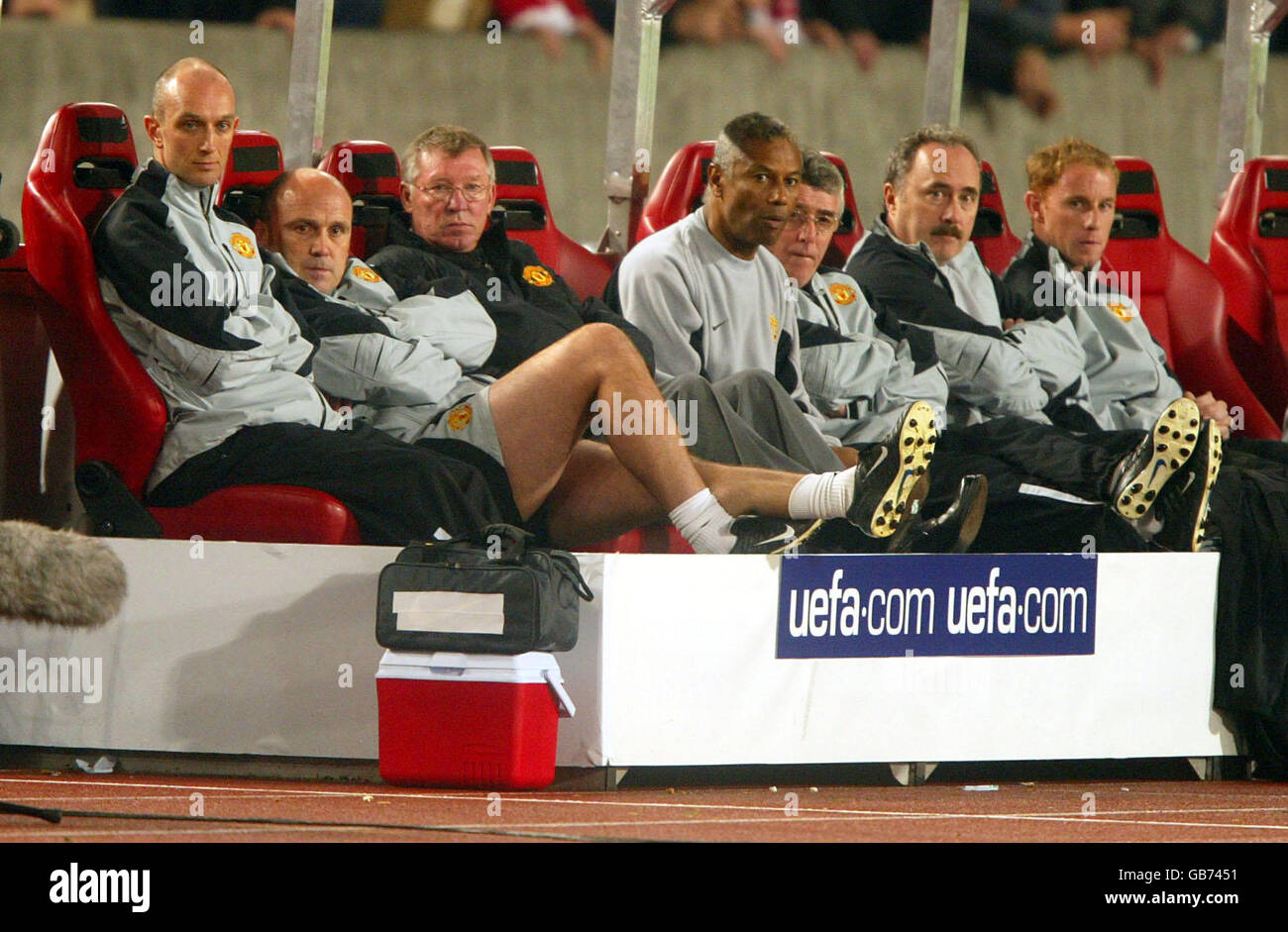 Manchester united manager alex ferguson on the bench hi-res stock ...