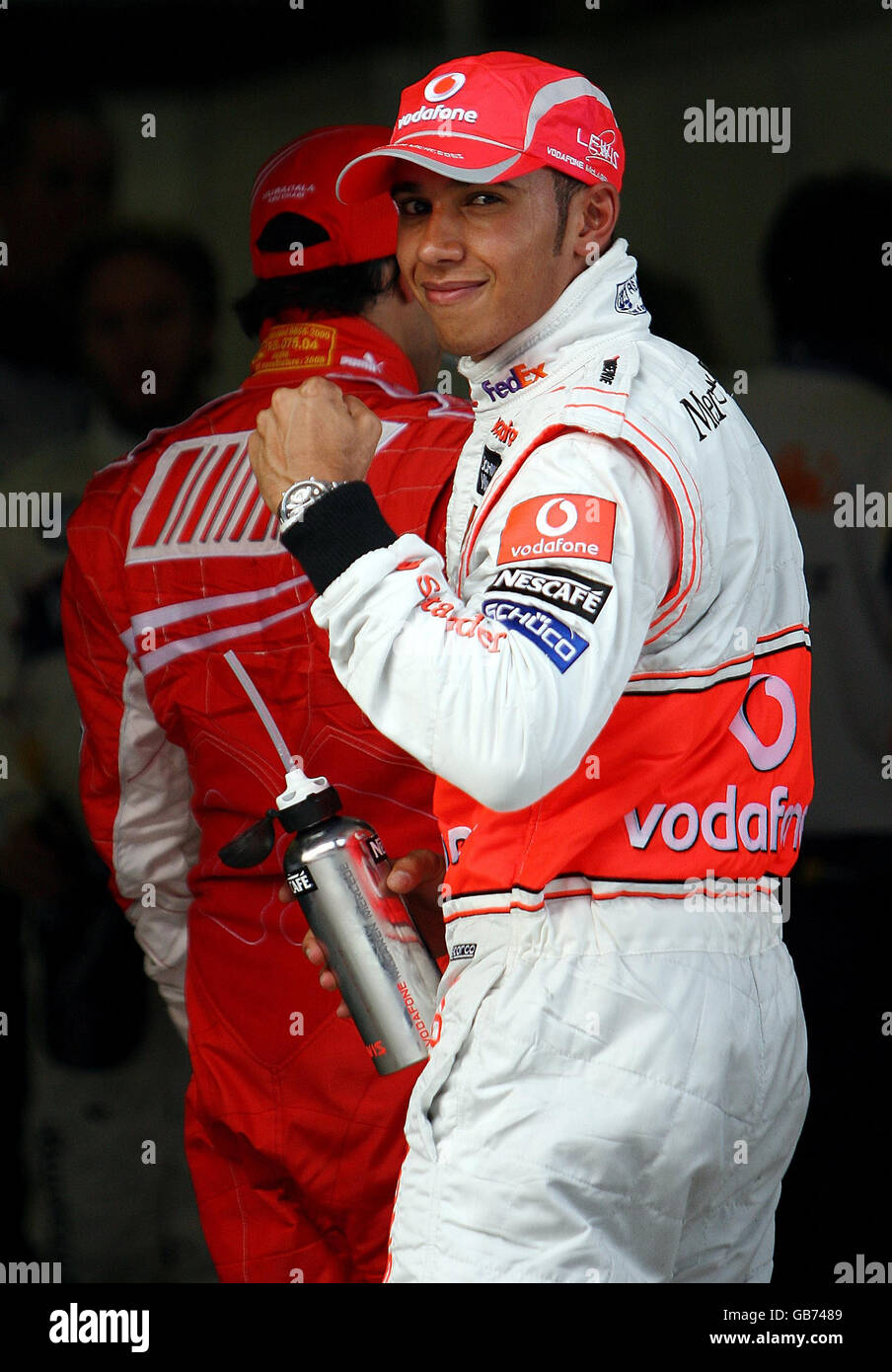 Lewis Hamilton celebrates taking Pole Position at the Shanghai ...