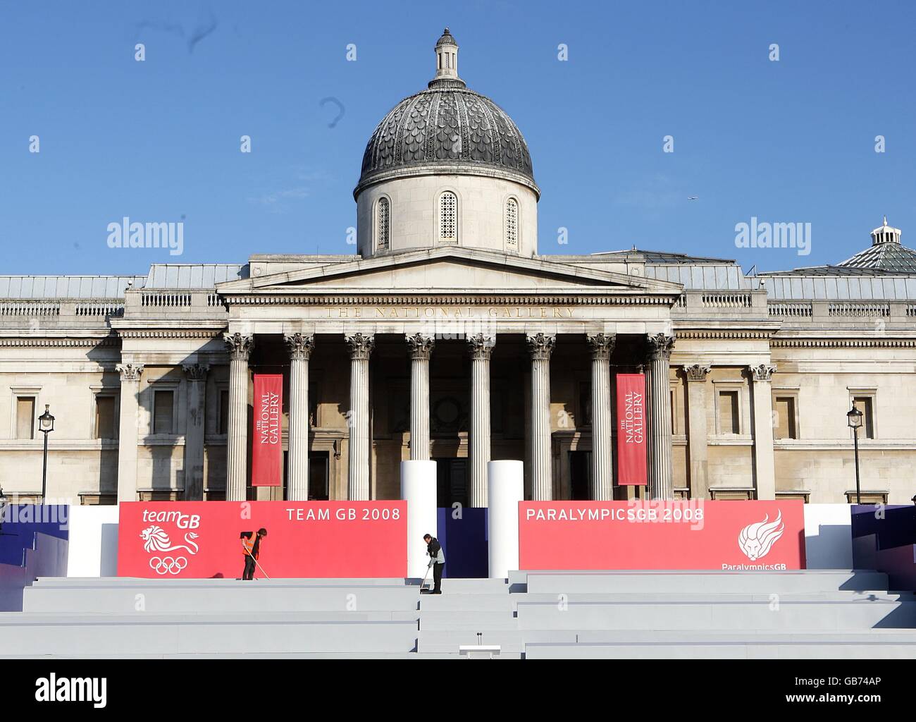 Olympics - Team GB Beijing Homecoming Parade - London. Two workers ...