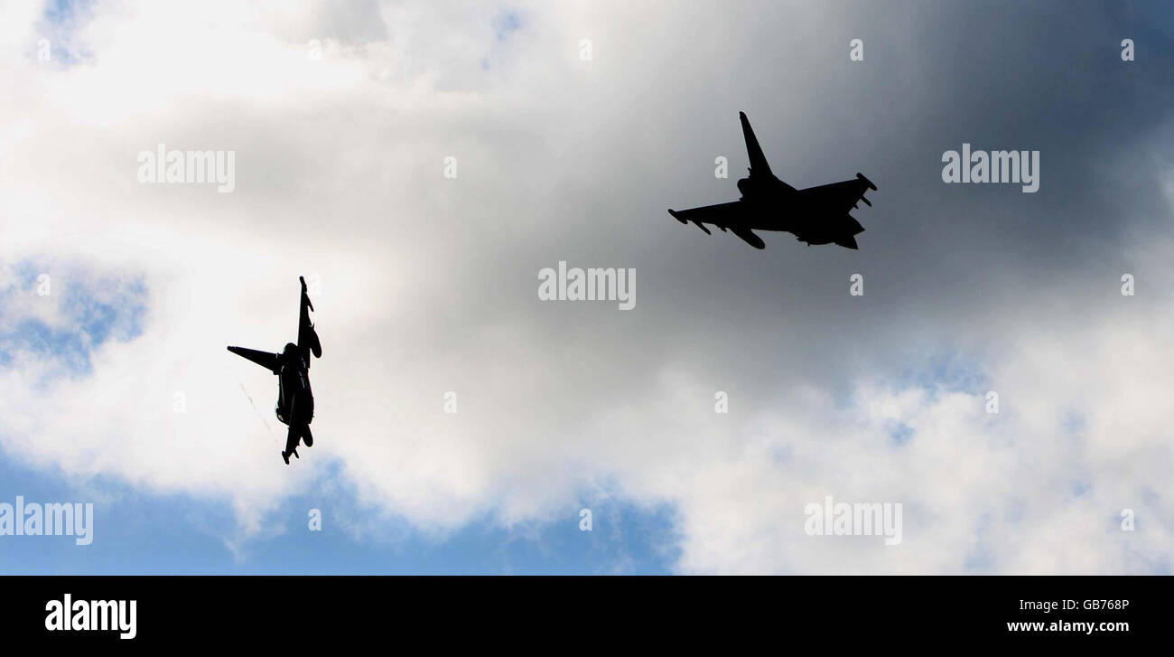 Two Typhoon Tranche 2 aircraft perform a flypast at RAF Coningsby ...