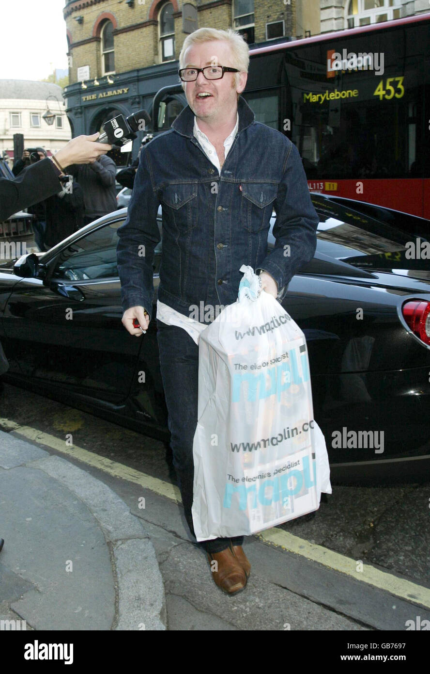 Chris Evans arrives in his Ferrari at The Portland hospital after ...