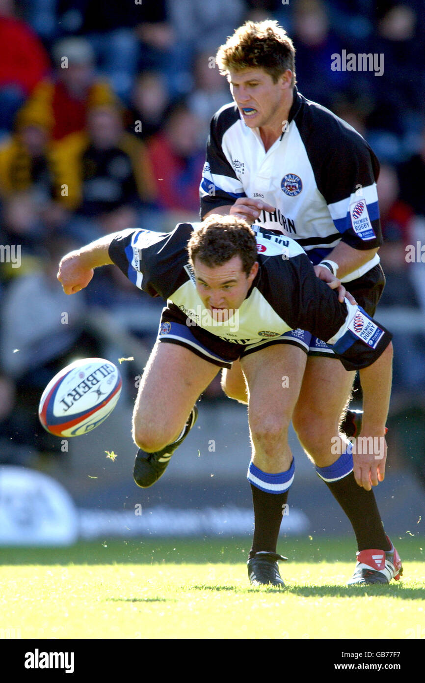Bath's Michael Lipman (top) holds teammate Chris Malone (bottom) as he ...