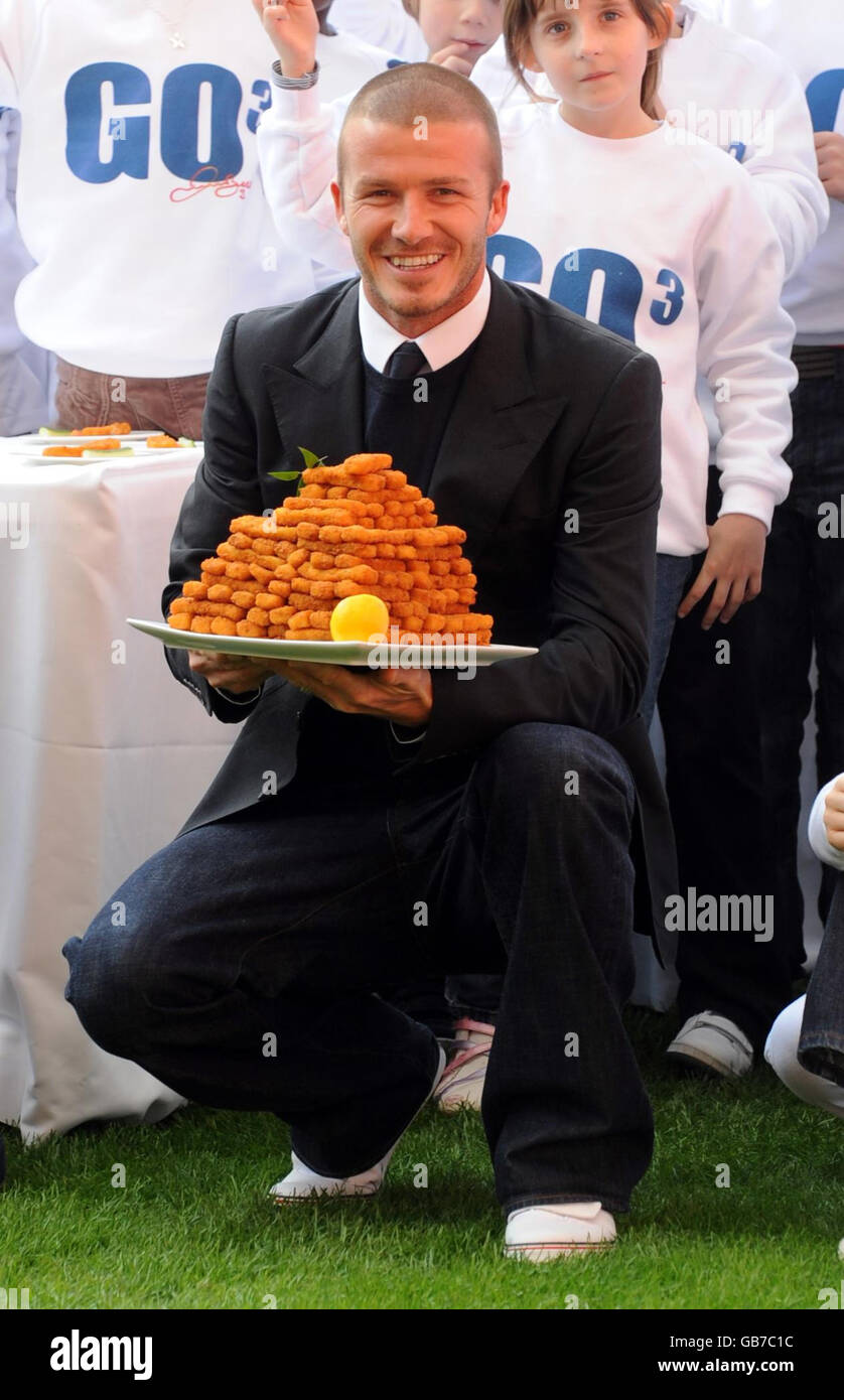 David Beckham hosts a fish finger feast for school children on the pith ...