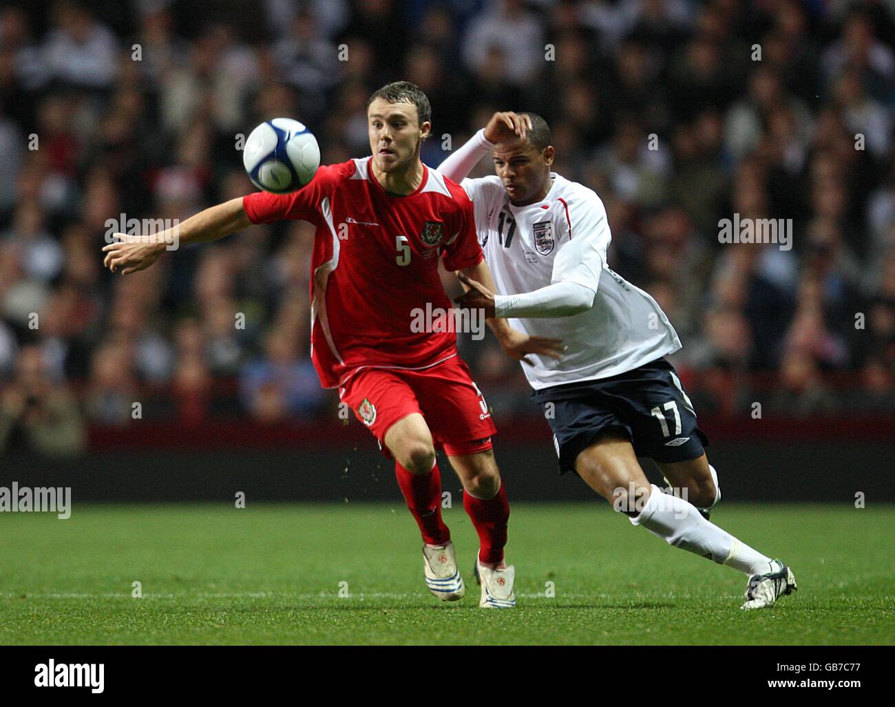 Wales blake englands fraizer campbell battle for the ball hi-res stock ...