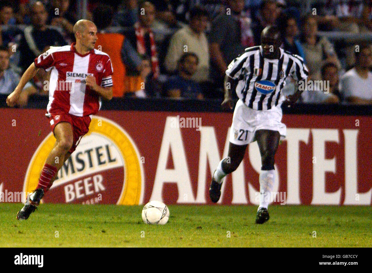 Olympiakos' Predrag Djordjevic (l) and Juventus' Lilian Thuram Stock ...
