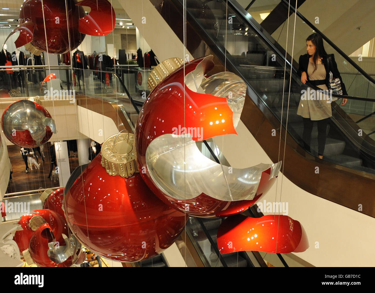 Giant red baubles in Selfridges department store in central London go ...