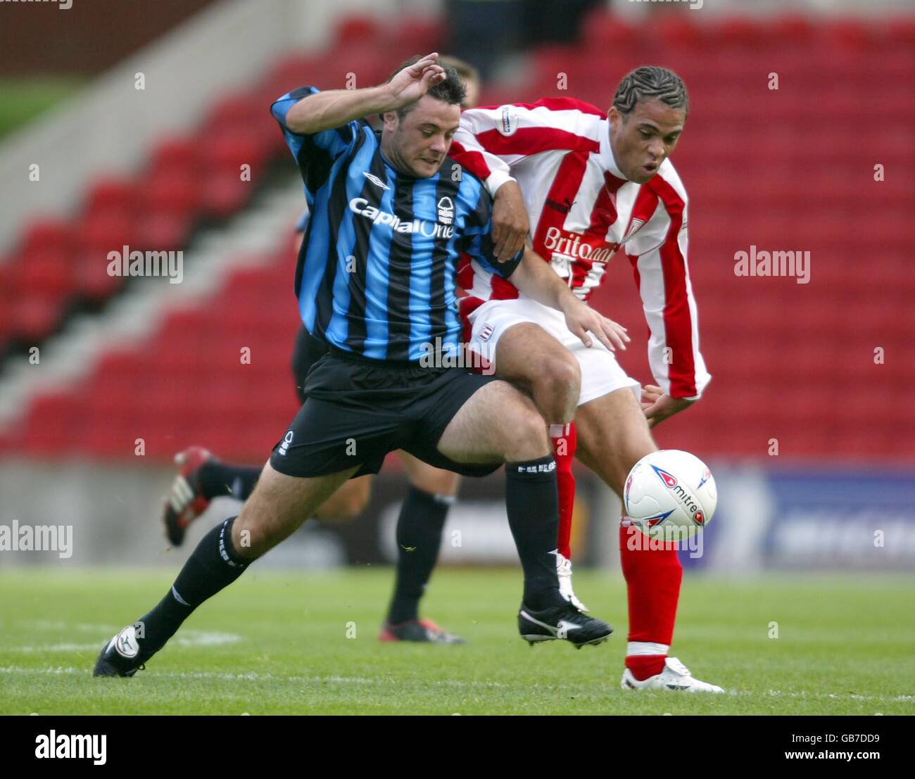 Stoke City's Darel Russell and Nottingham Forest's Andy Reid battle for ...