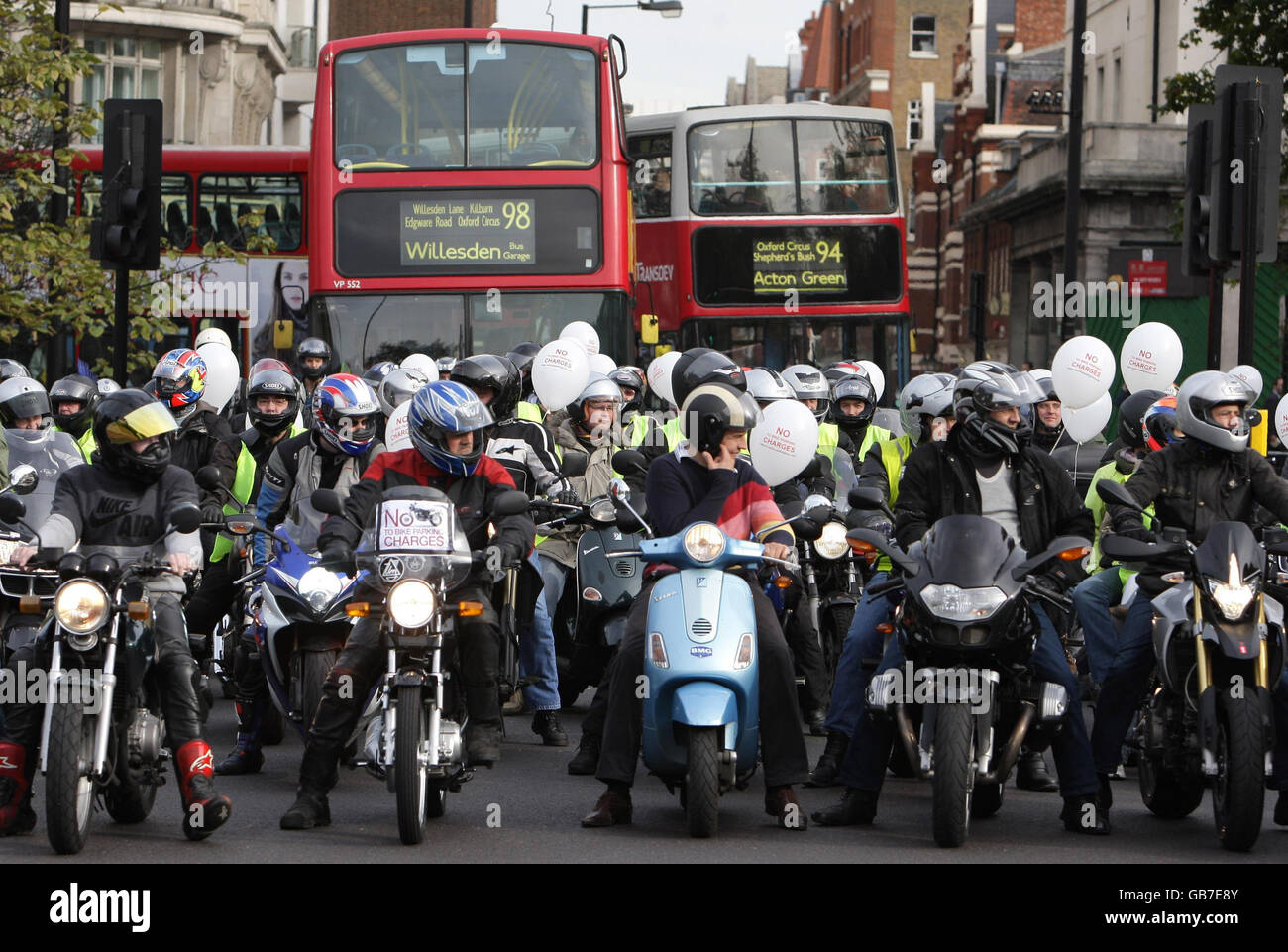 Protesters riding motorbikes and scooters block traffic at the Marble ...