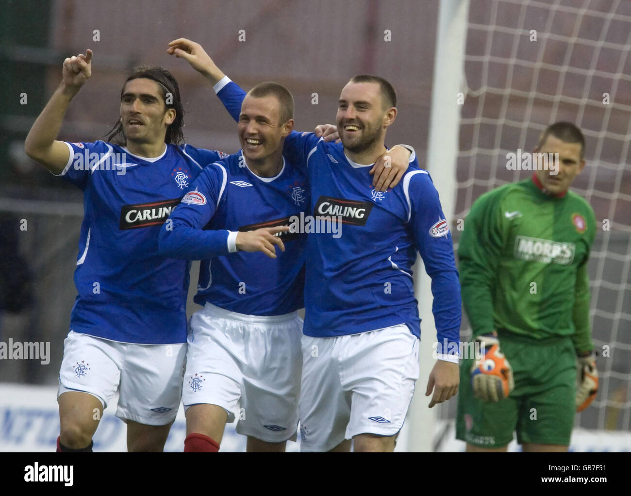 Rangers striker Kris Boyd (right) celebrates with Pedro Mendes (left ...