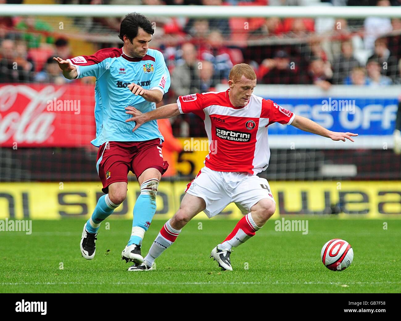 Burnley's Steven Thompson and Charlton Athletic's Nick Bailey battle ...