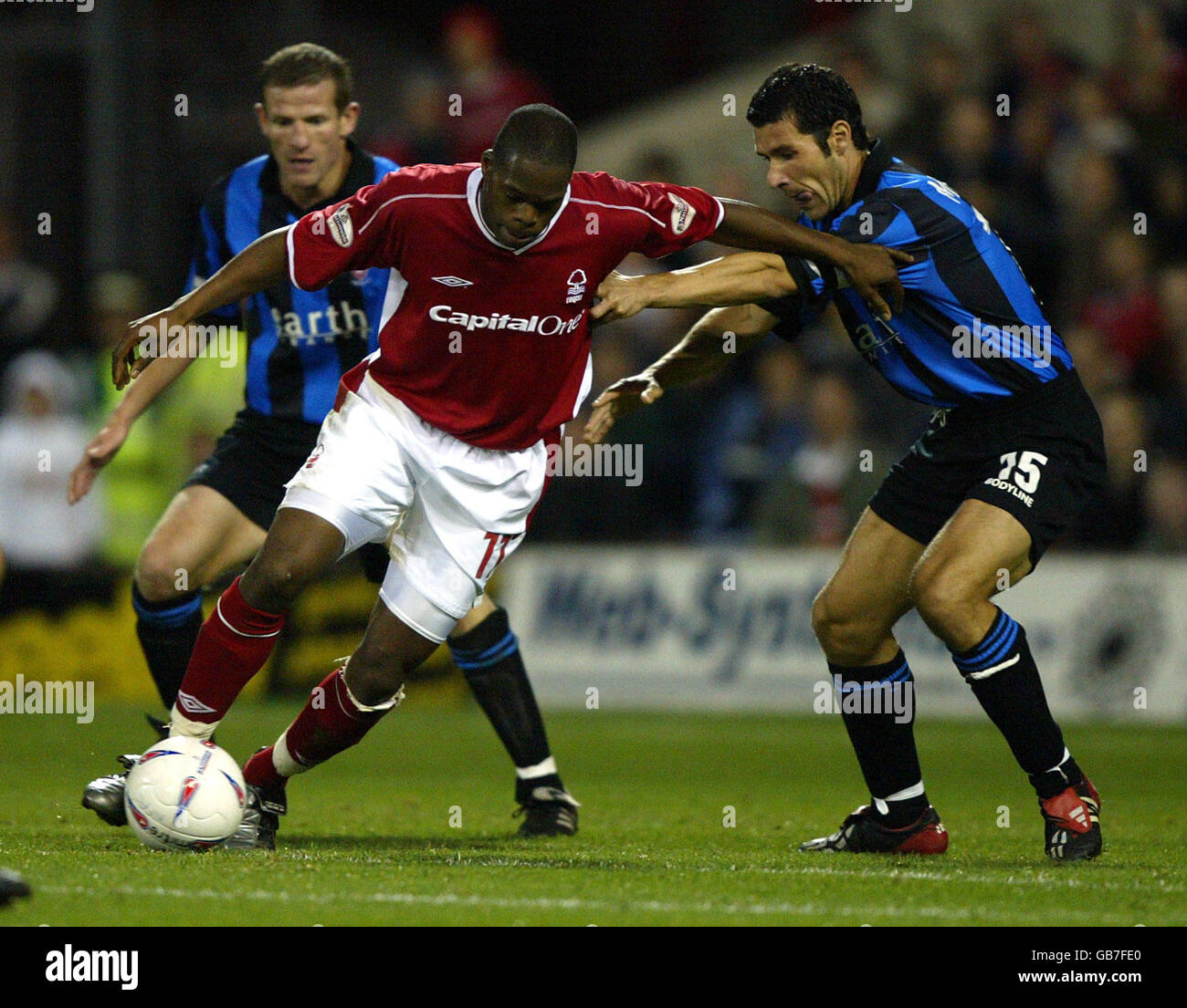 Nottingham Forest's Marlon Harewood is tackled by Rotherham United's ...