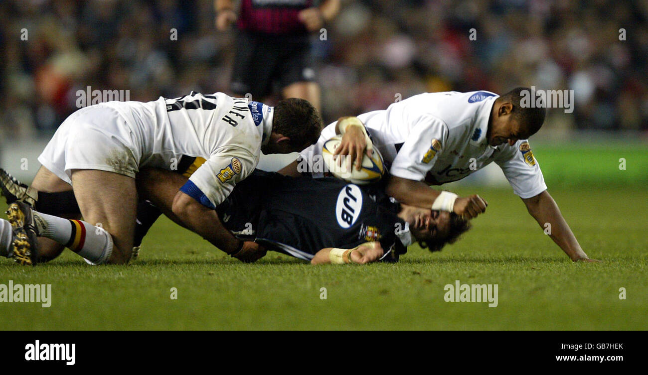 Bradford Bulls' Leon Pryce smashes Wigan Warriors' Brian Carney in the ...