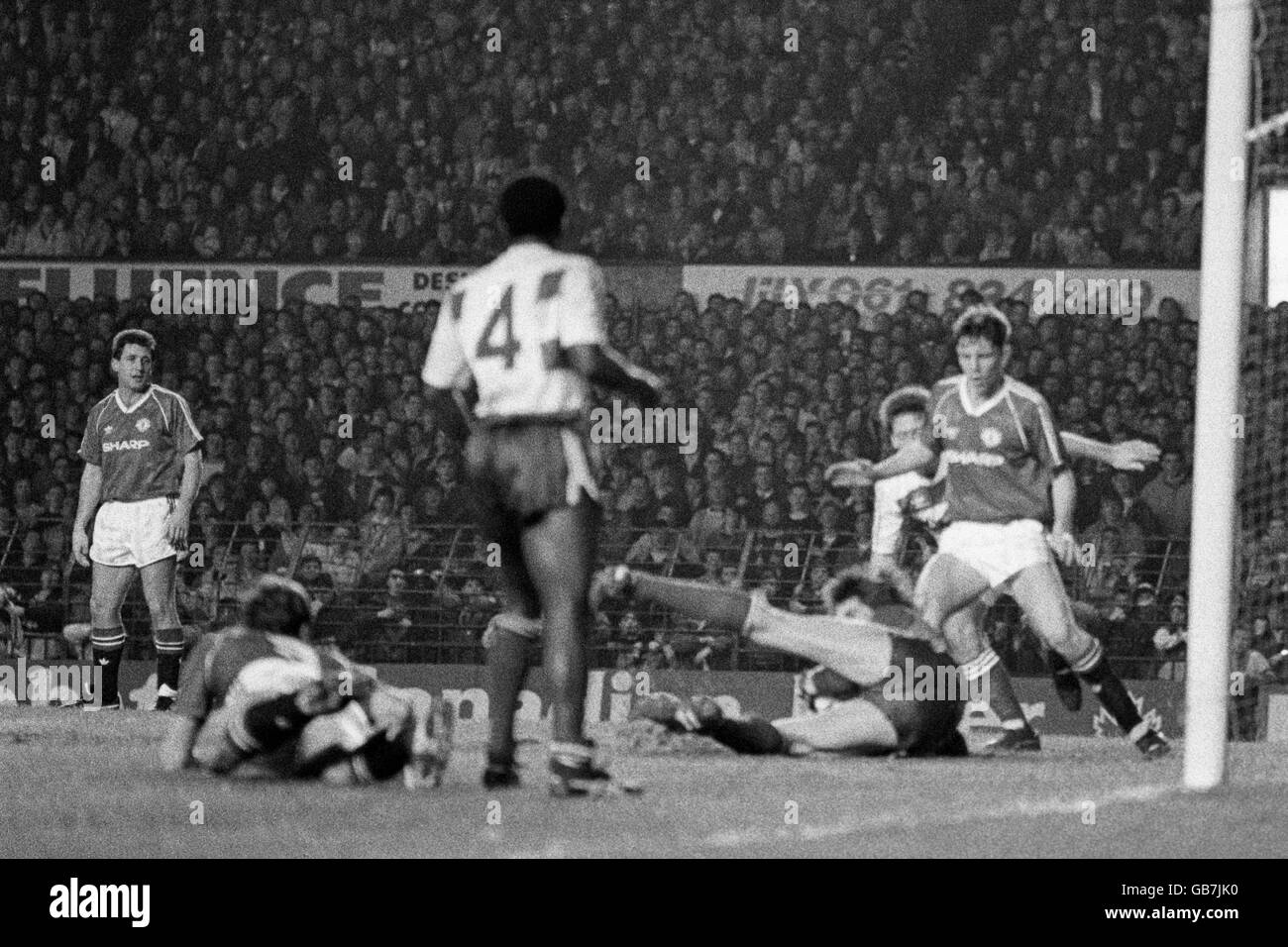 Queens Park Rangers goalkeeper David Seaman saves from Manchester ...