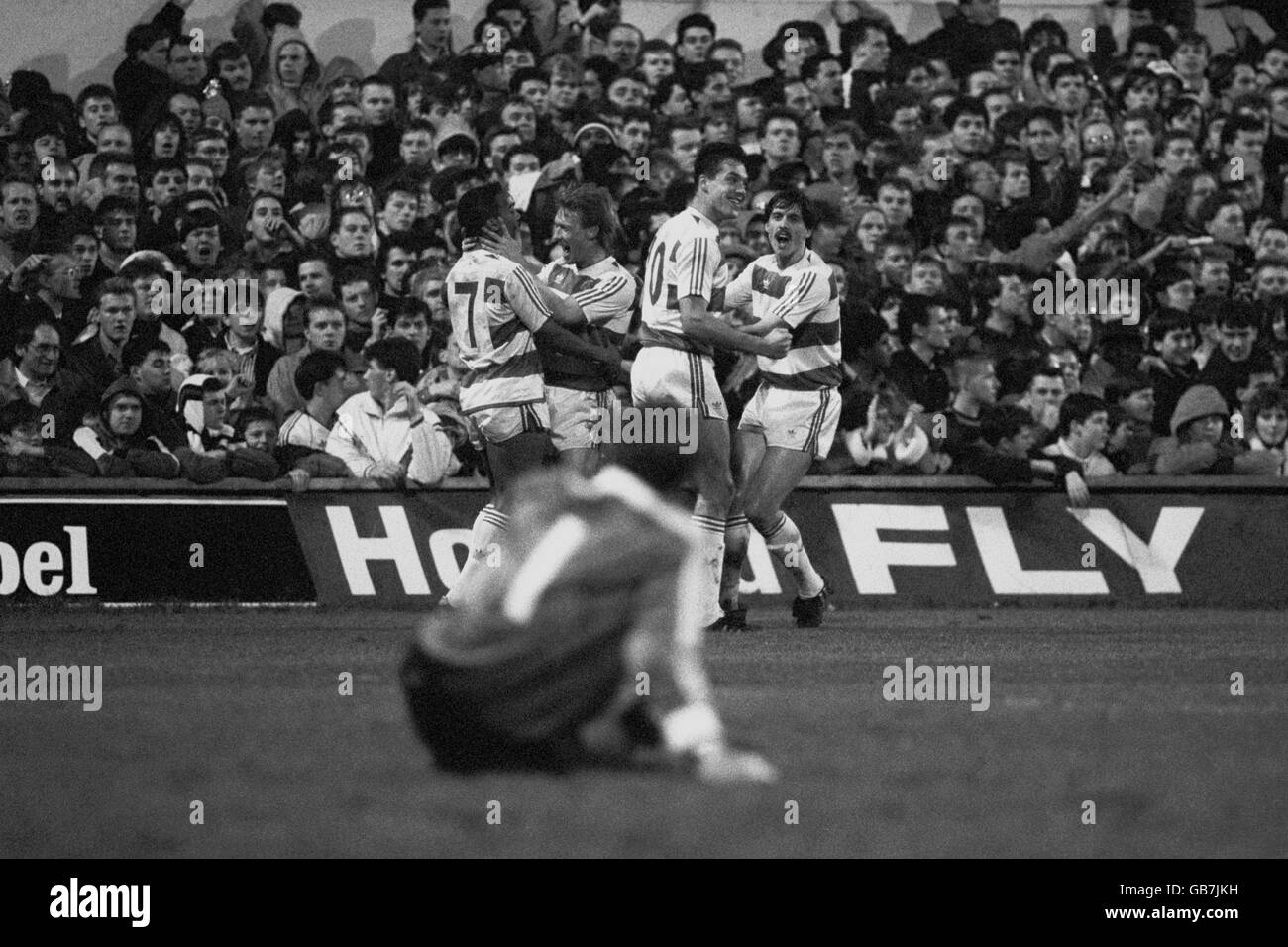 Manchester United goalkeeper Jim Leighton, watches QPR team mates ...