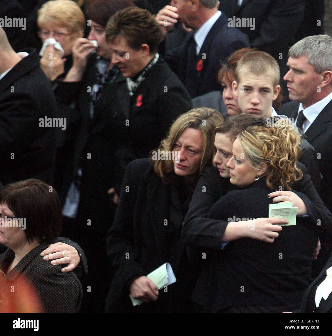Mourners at the funeral of David and Michelle Statham and their four ...