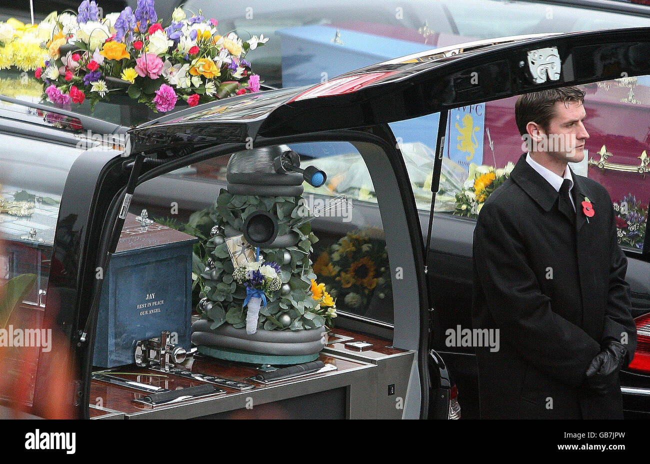 Jay's coffin, shaped like a Tardis (left) at the funeral of David and ...