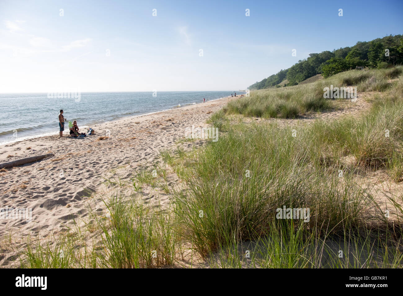 Families playing on the beach at Lake Michigan in Muskegon State Park ...