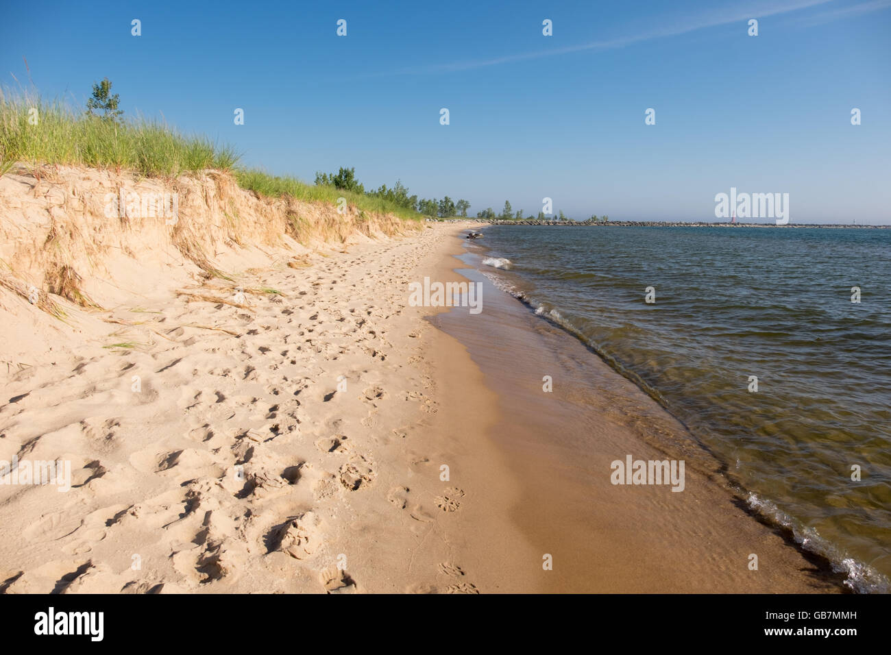 Narrow beach at Lake Michigan due to high water Stock Photo - Alamy