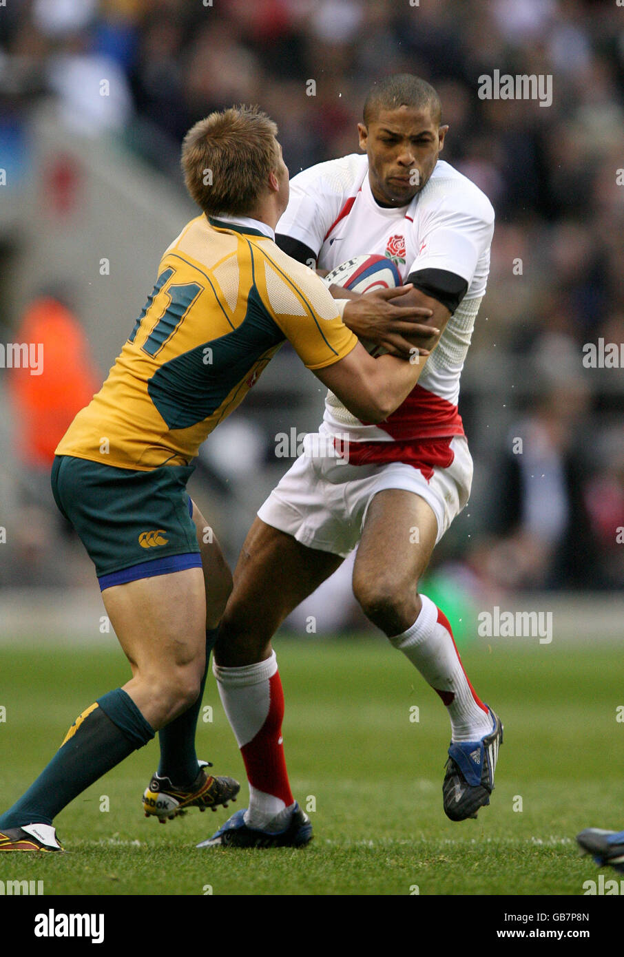 England's Delon Armitage is tackled by Australia's Drew Mitchell Stock ...