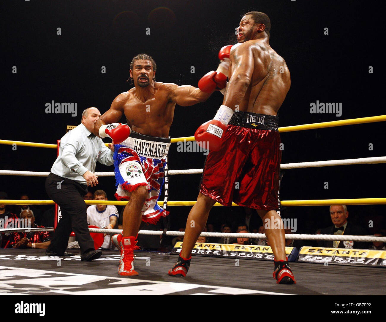 Britain's David Haye (left) and USA's Monte Barrett in action during ...