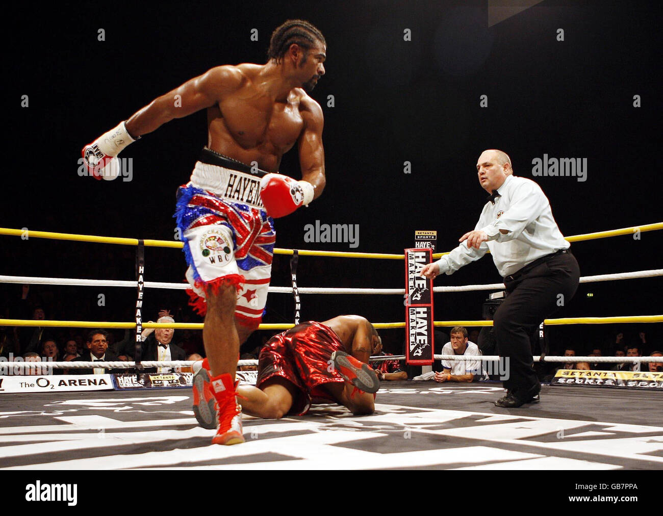 Britain's David Haye knocks down USA's Monte Barrett during the ...