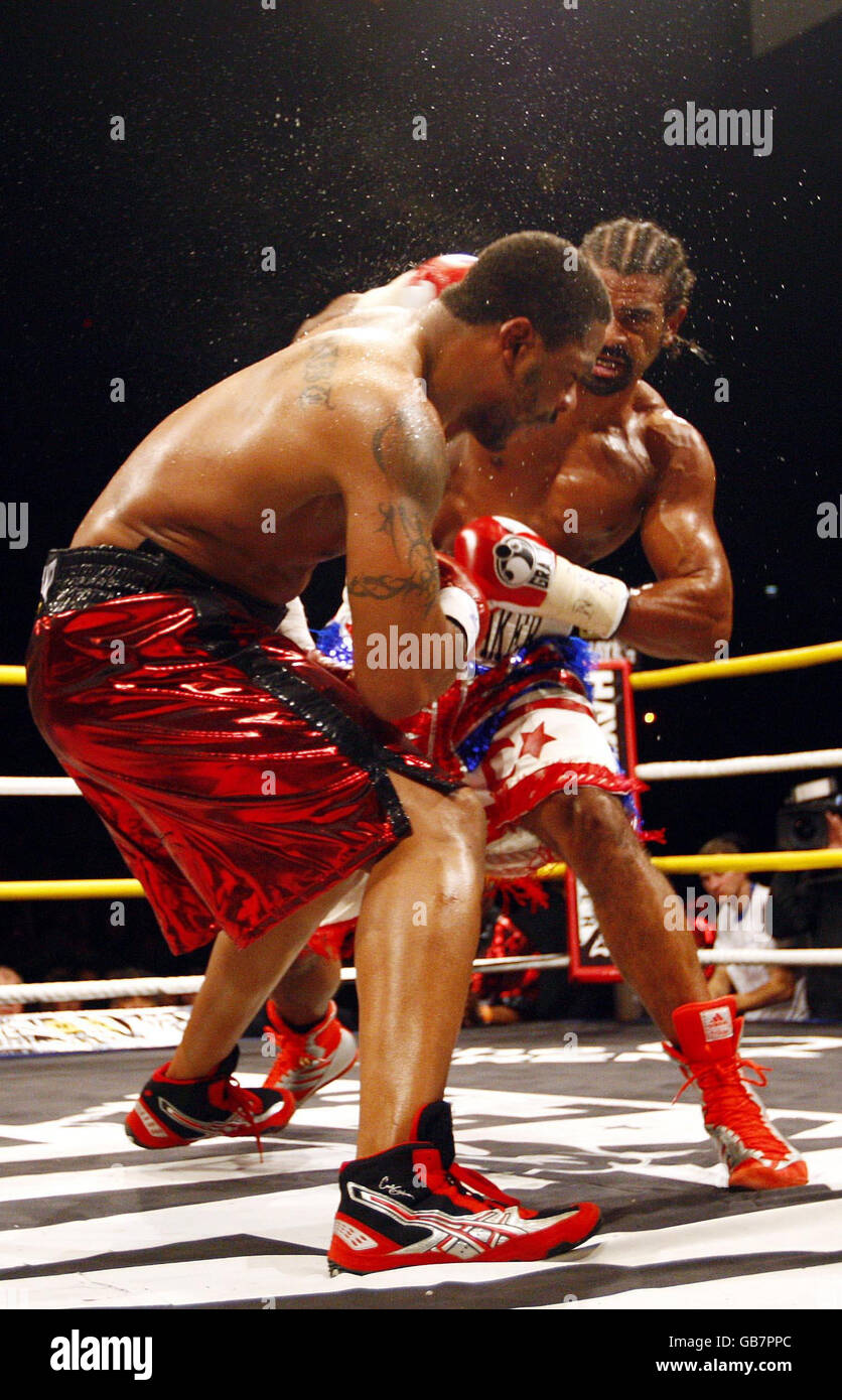 Britain's David Haye and USA's Monte Barrett during the Heavyweight ...