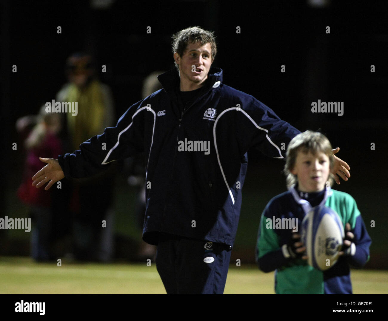 Scotland Rugby's Mark Robertson coaches the children during the ...
